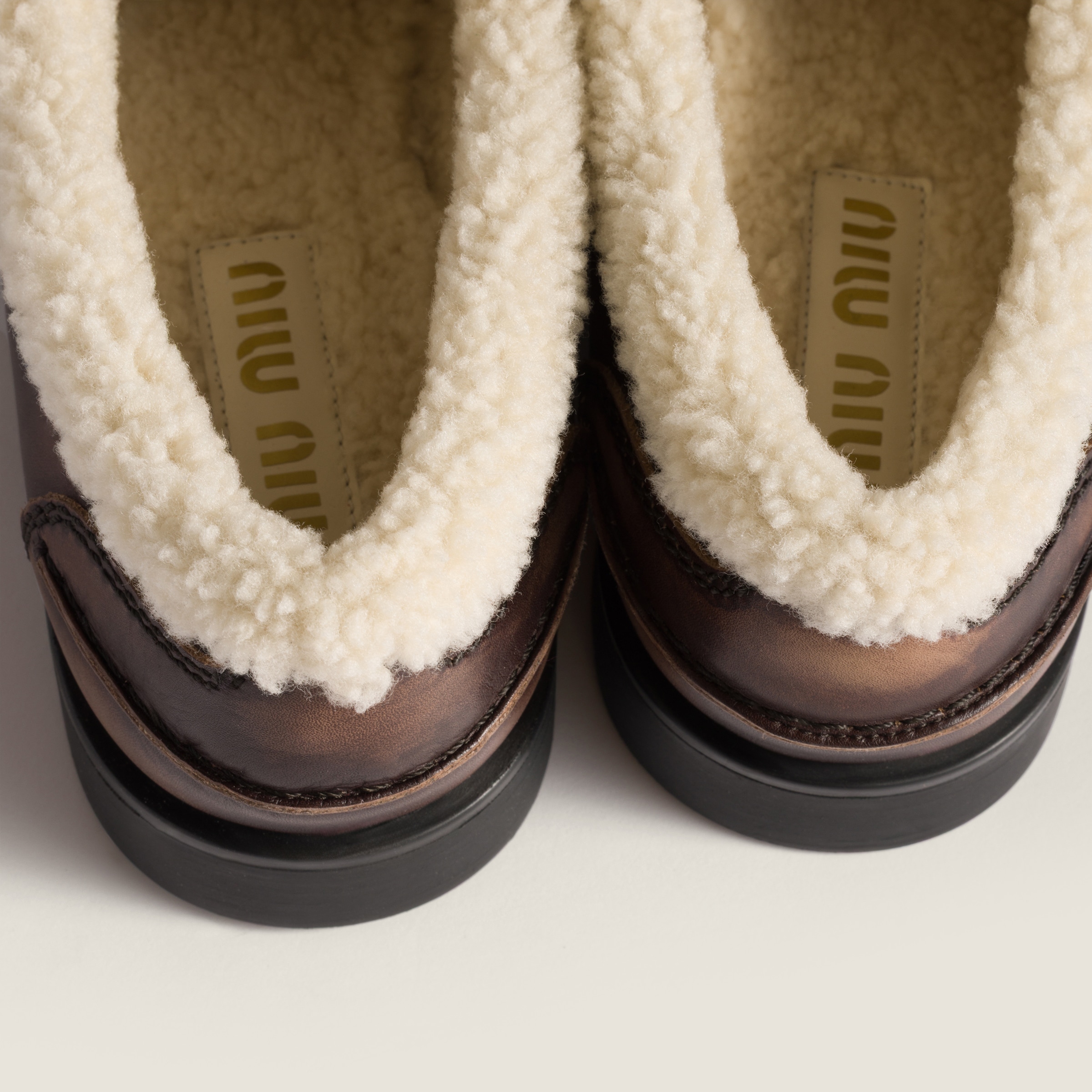 Ebony Bleached Leather And Shearling Penny Loafers | Miu Miu