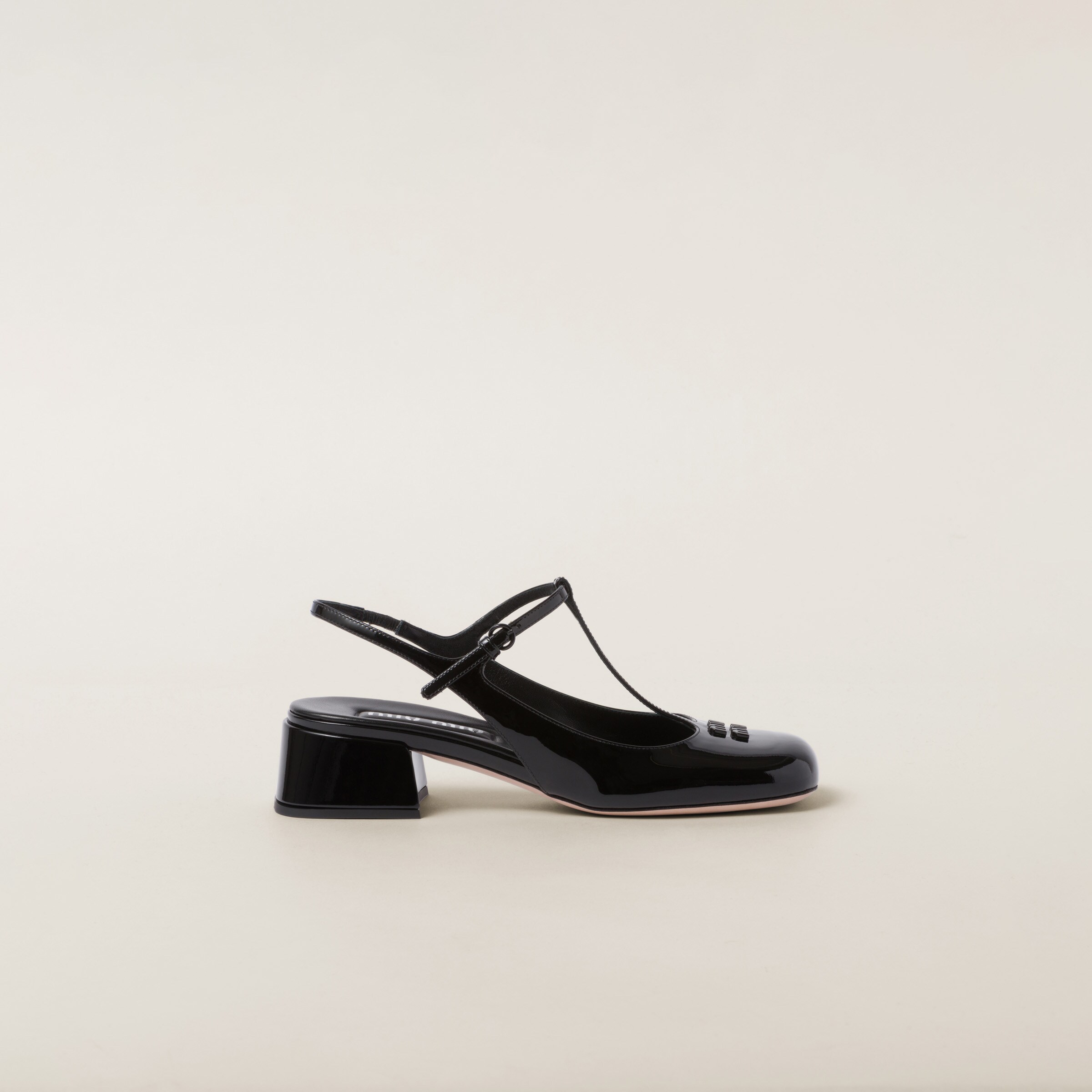Black Patent Leather Slingback Pumps | Miu Miu