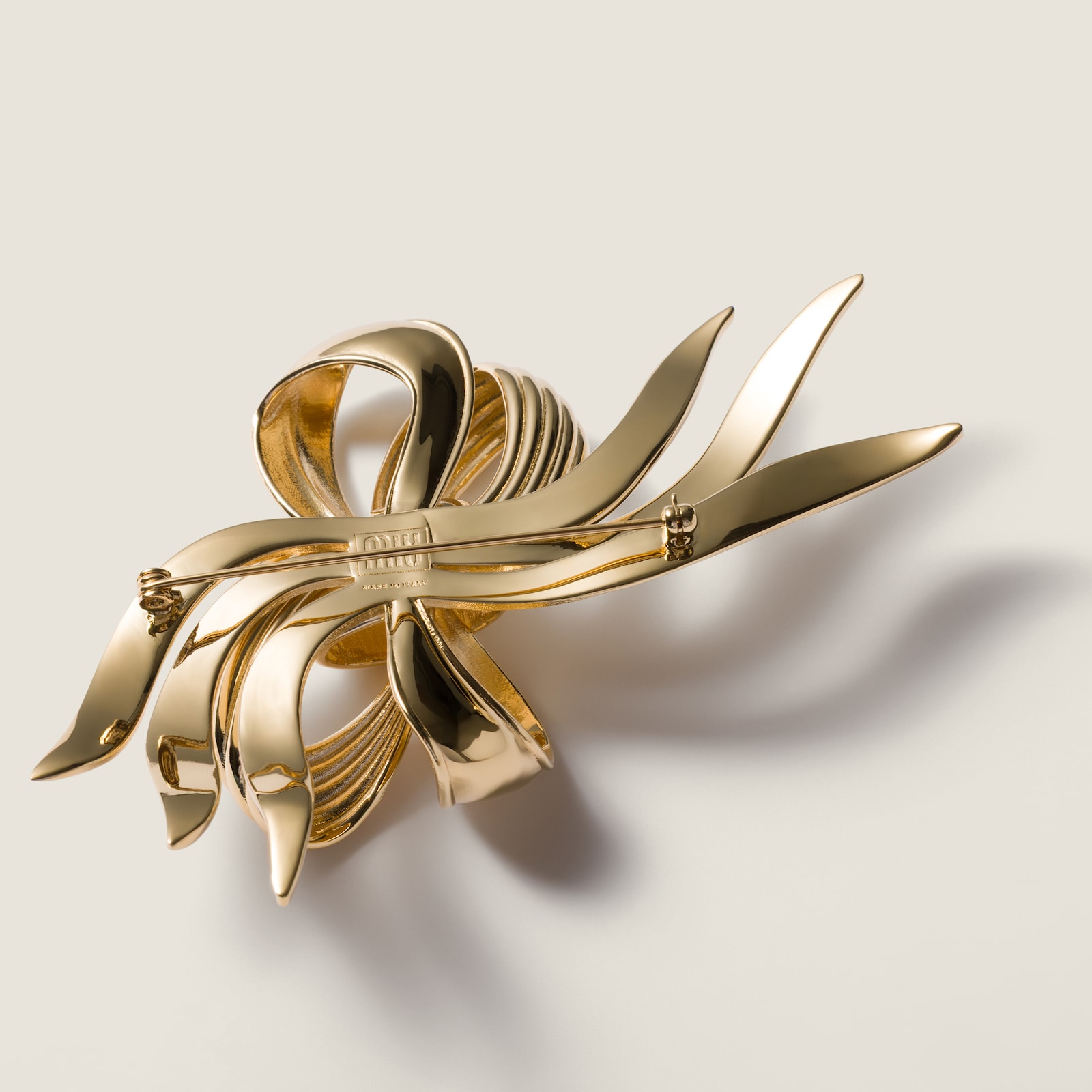 Gold Metal Bow Brooch | Miu Miu
