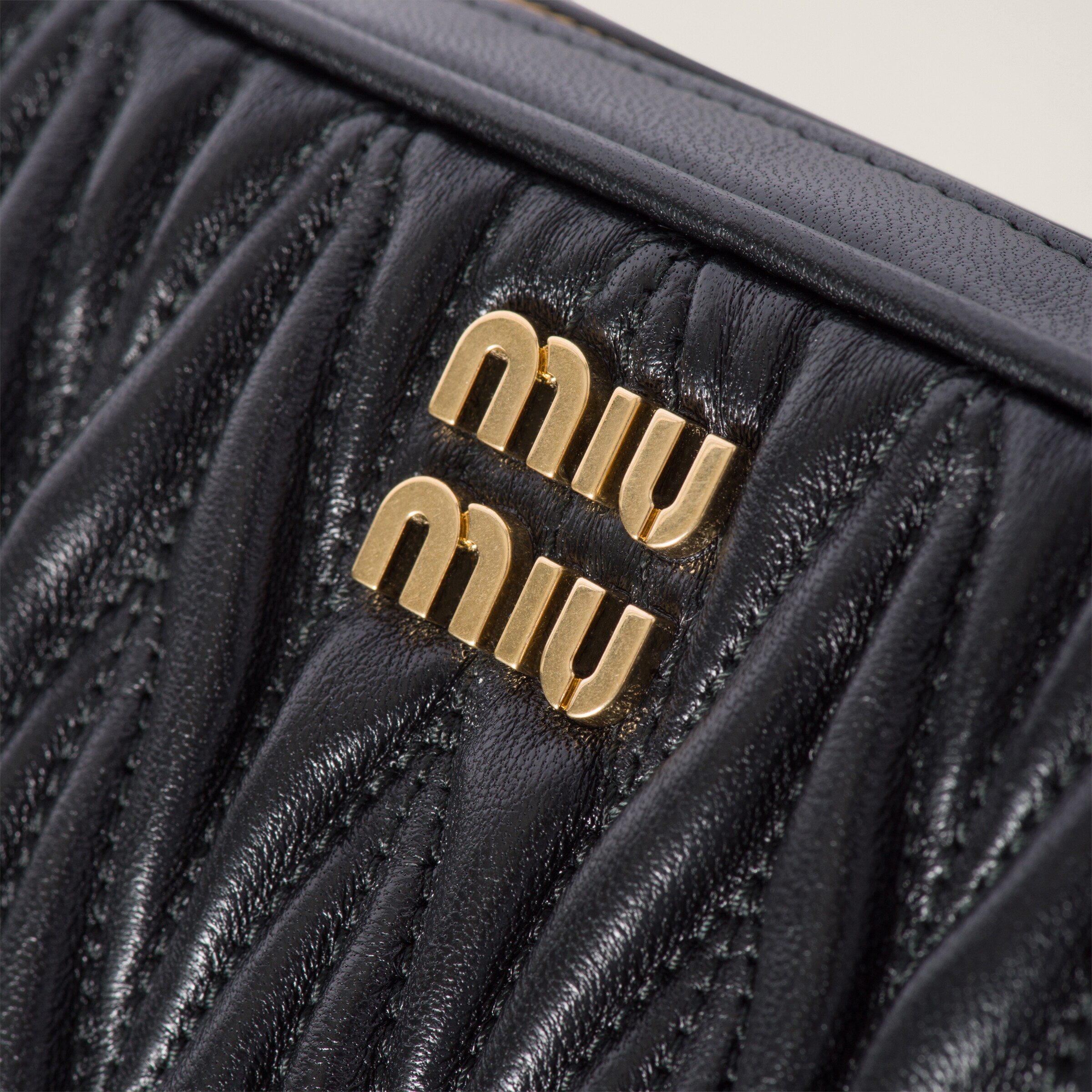 Black Matelassé Nappa Leather Pouch | Miu Miu