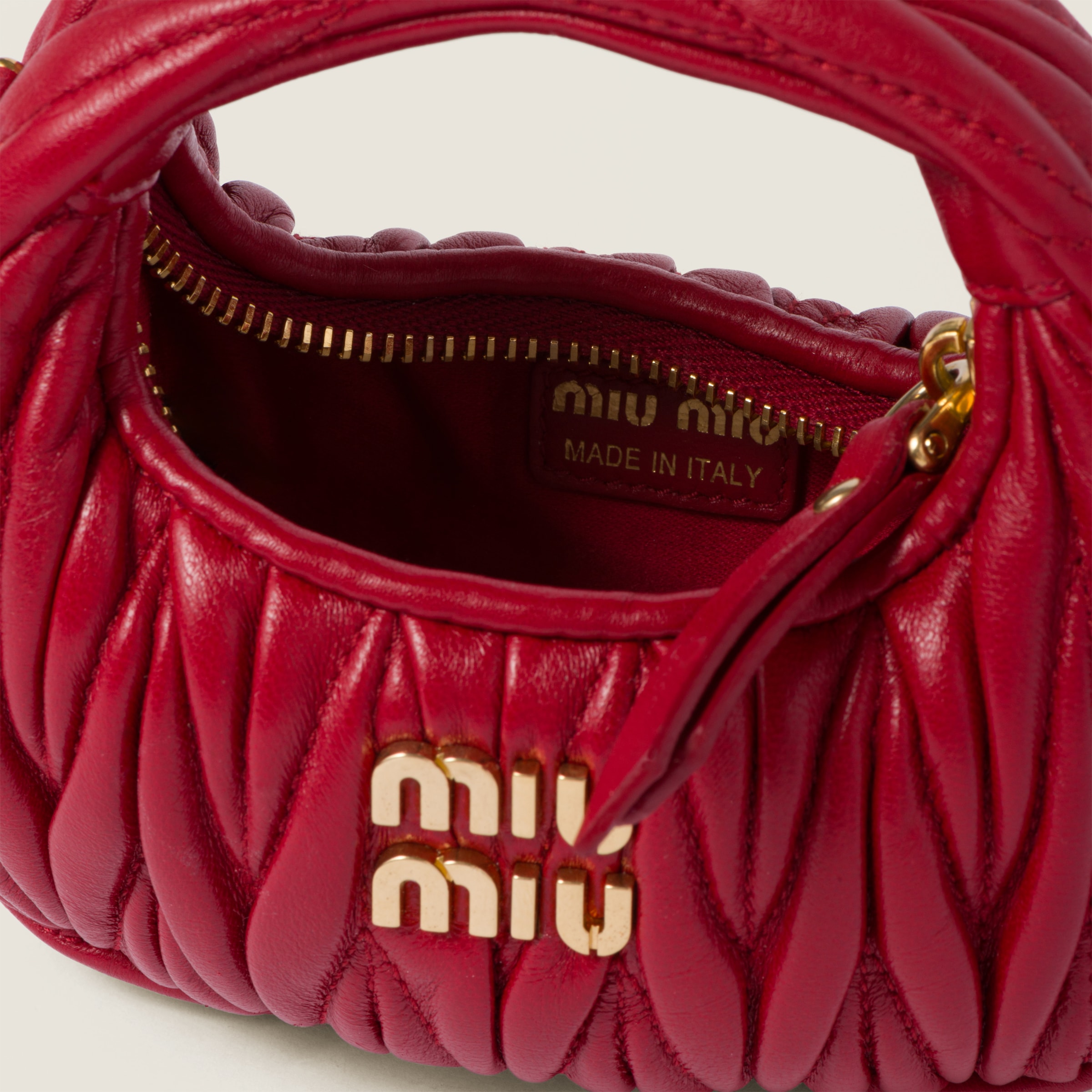 Red Wander Matelassé Nappa Leather Micro Hobo Bag | Miu Miu