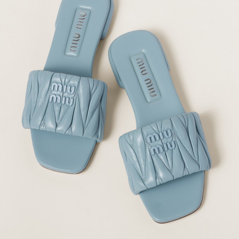 Light Blue Matelassé Nappa Leather Slides | Miu Miu
